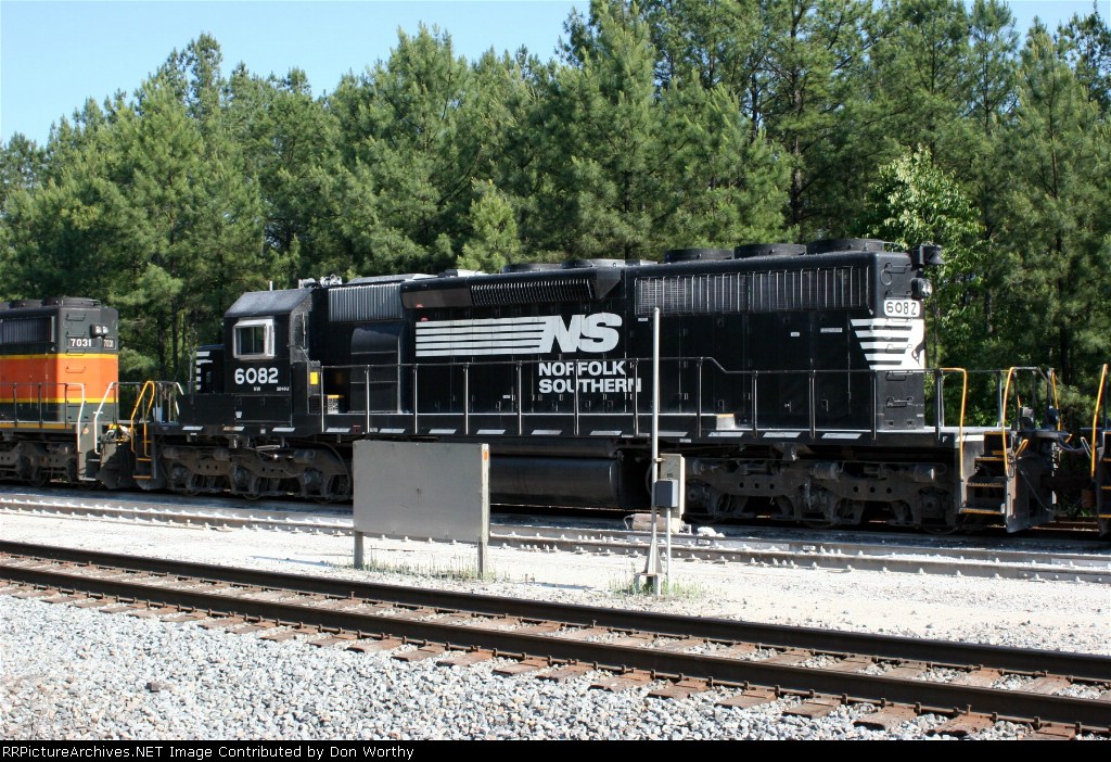 NS 6082 is dusty from switching duty at the chalk plant in McIntyre on 5-21-06